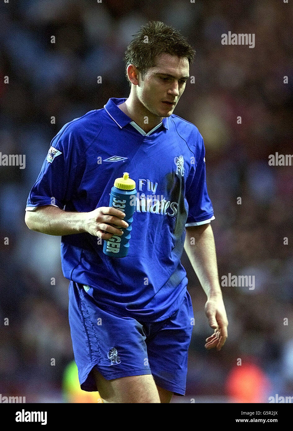 Chelsea's Frank Lampard walks off Villa Park's pitch after the draw ...