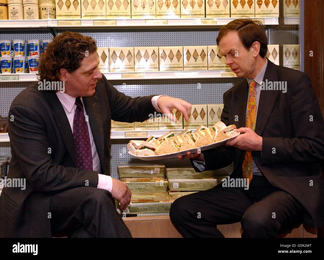 Chef Marco Pierre White (left) and John, the 11th Earl of Sandwich tuck ...