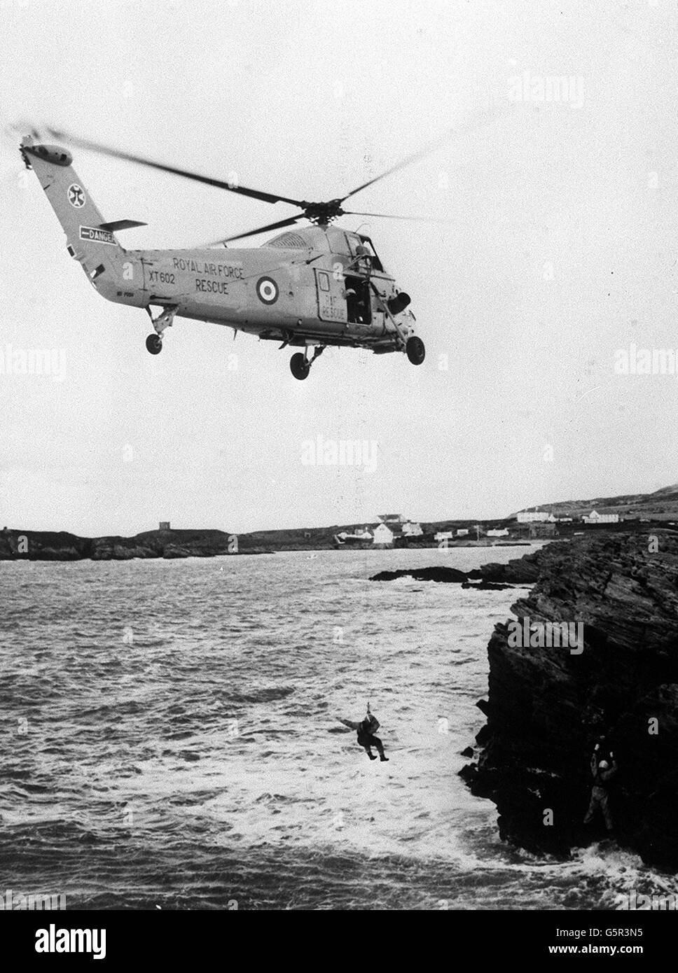 Helicopter rescue sea coast Black and White Stock Photos & Images - Alamy