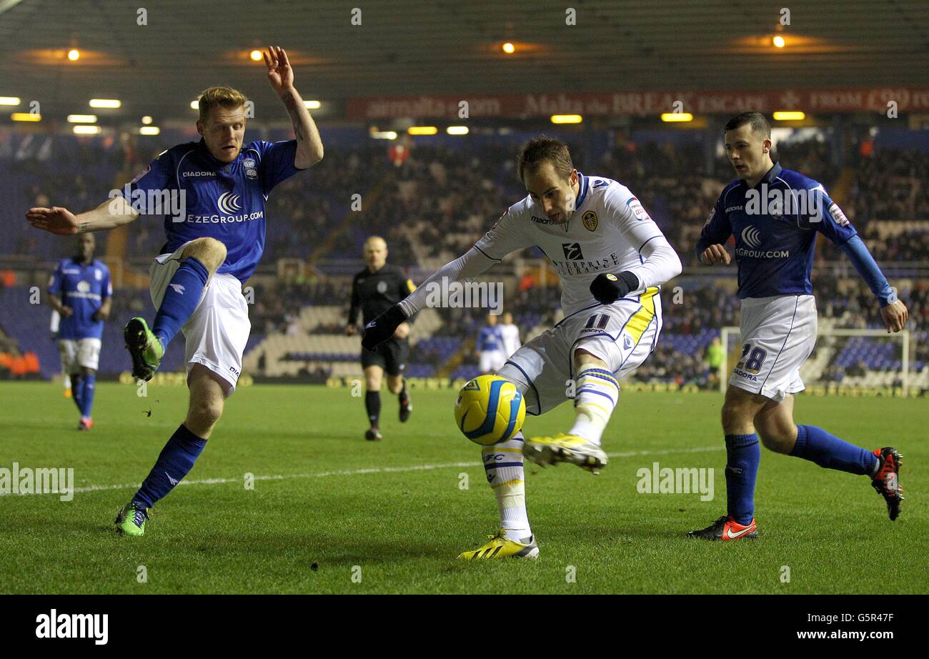 Leeds United's Luke Varney (centre) in action with Birmingham City's ...
