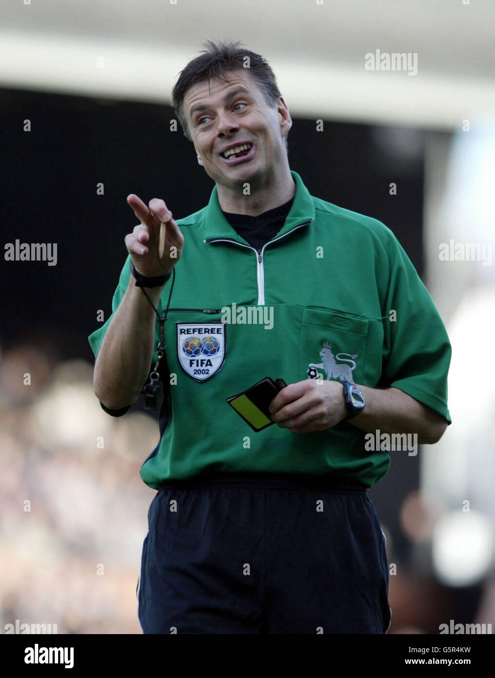 Player referee during match between hi-res stock photography and images ...