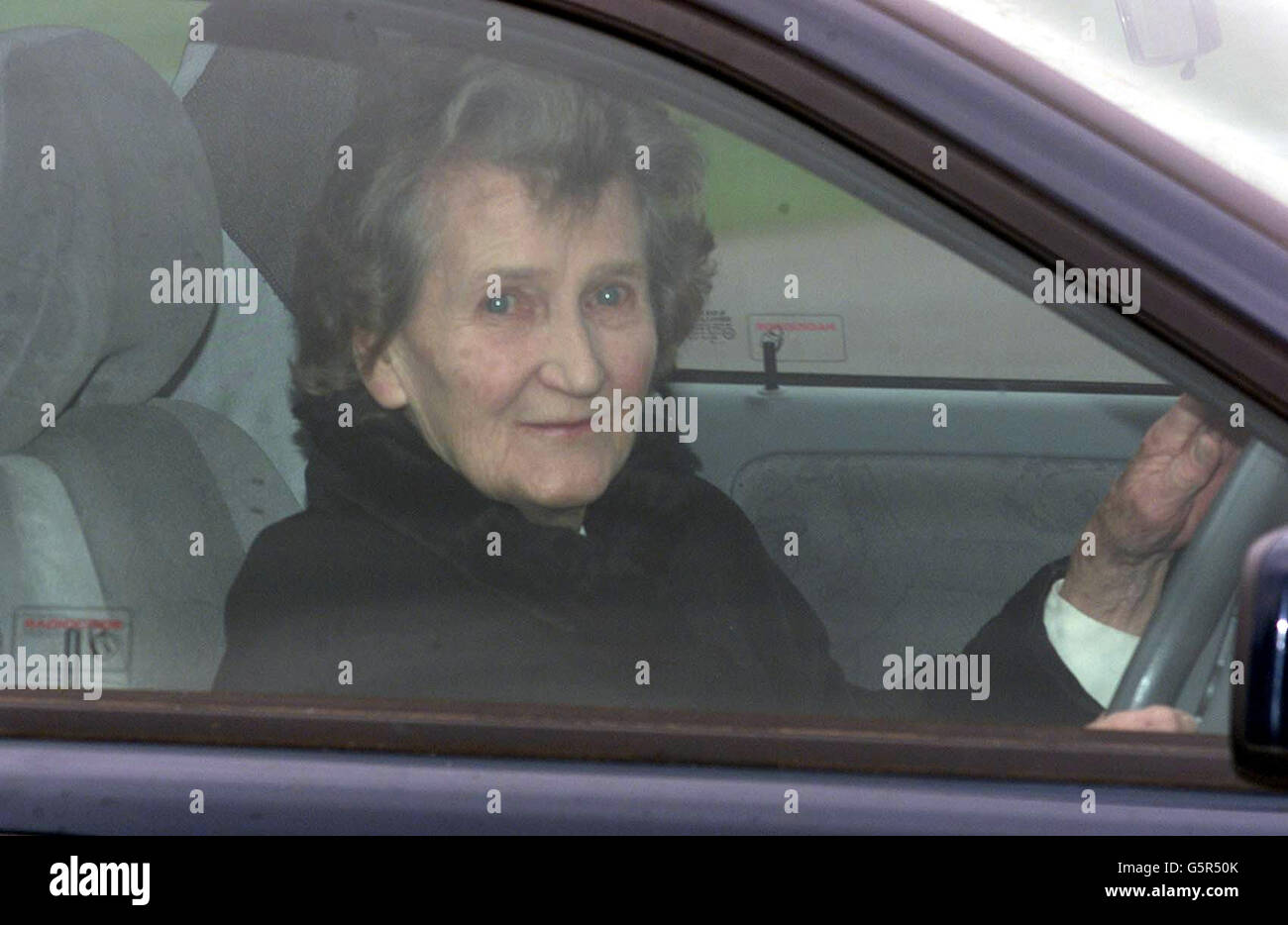 Margaret Rhodes, the Queen Mother's niece, arrives at the Royal Chapel ...
