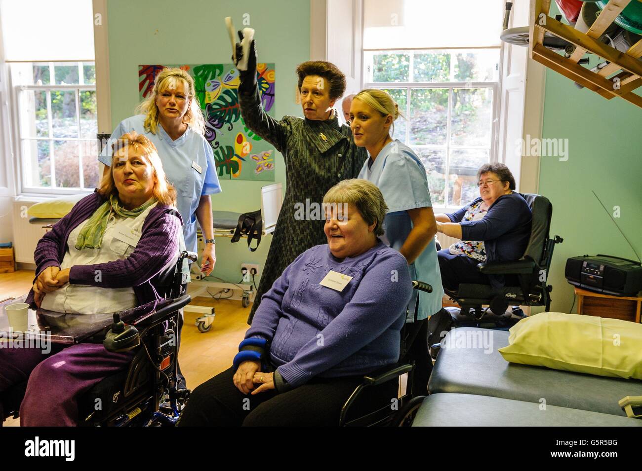 L-R: Anne Thompson, staff Physio Moni Robson, The Princess Royal ...