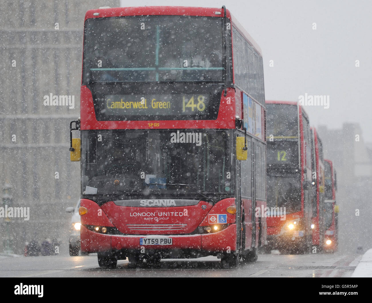 Buses in the snow hi-res stock photography and images - Alamy