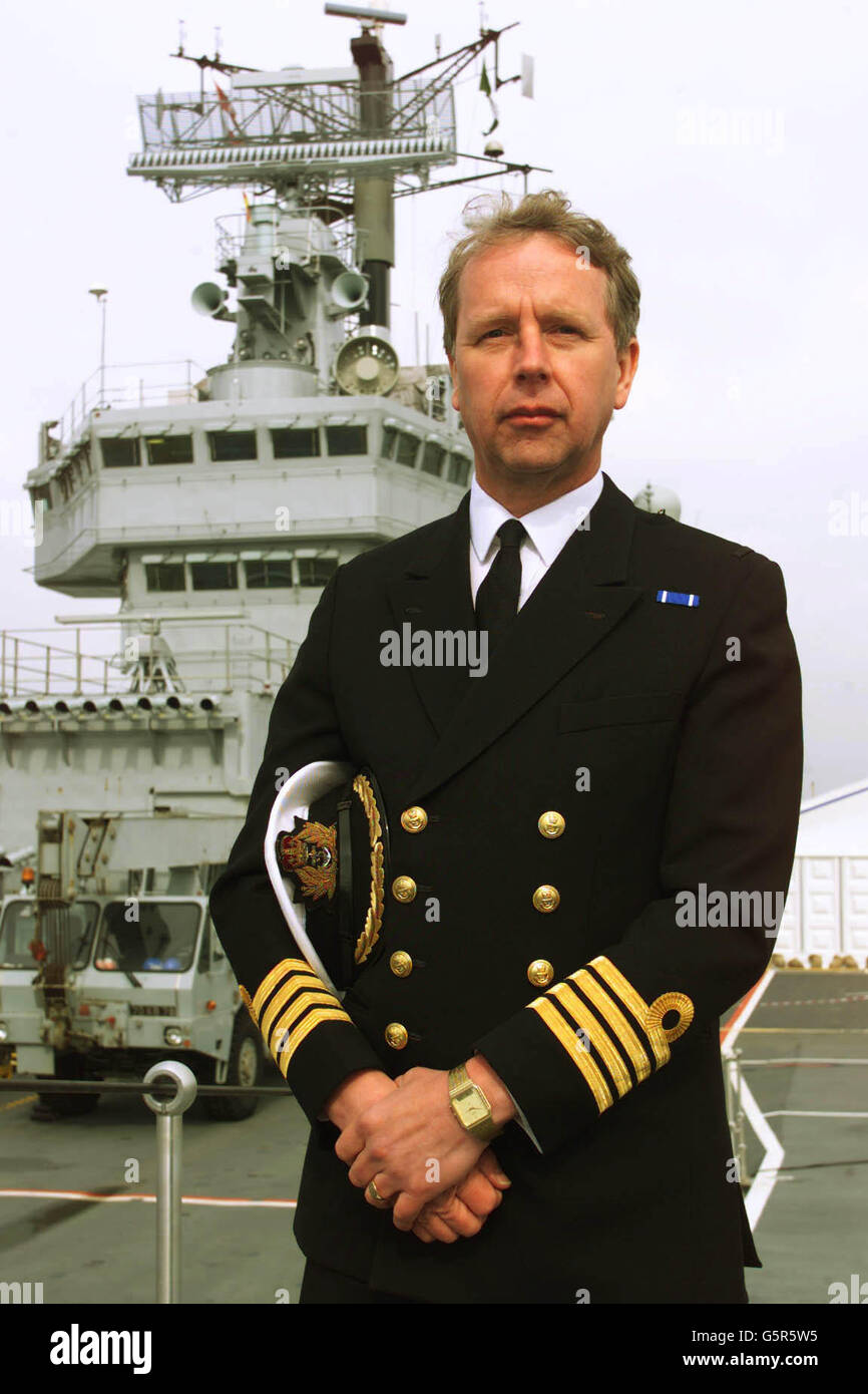 Captain David Snelson stands on the bow of HMS Ark Royal in Portsmouth's Royal Naval dockyard ...