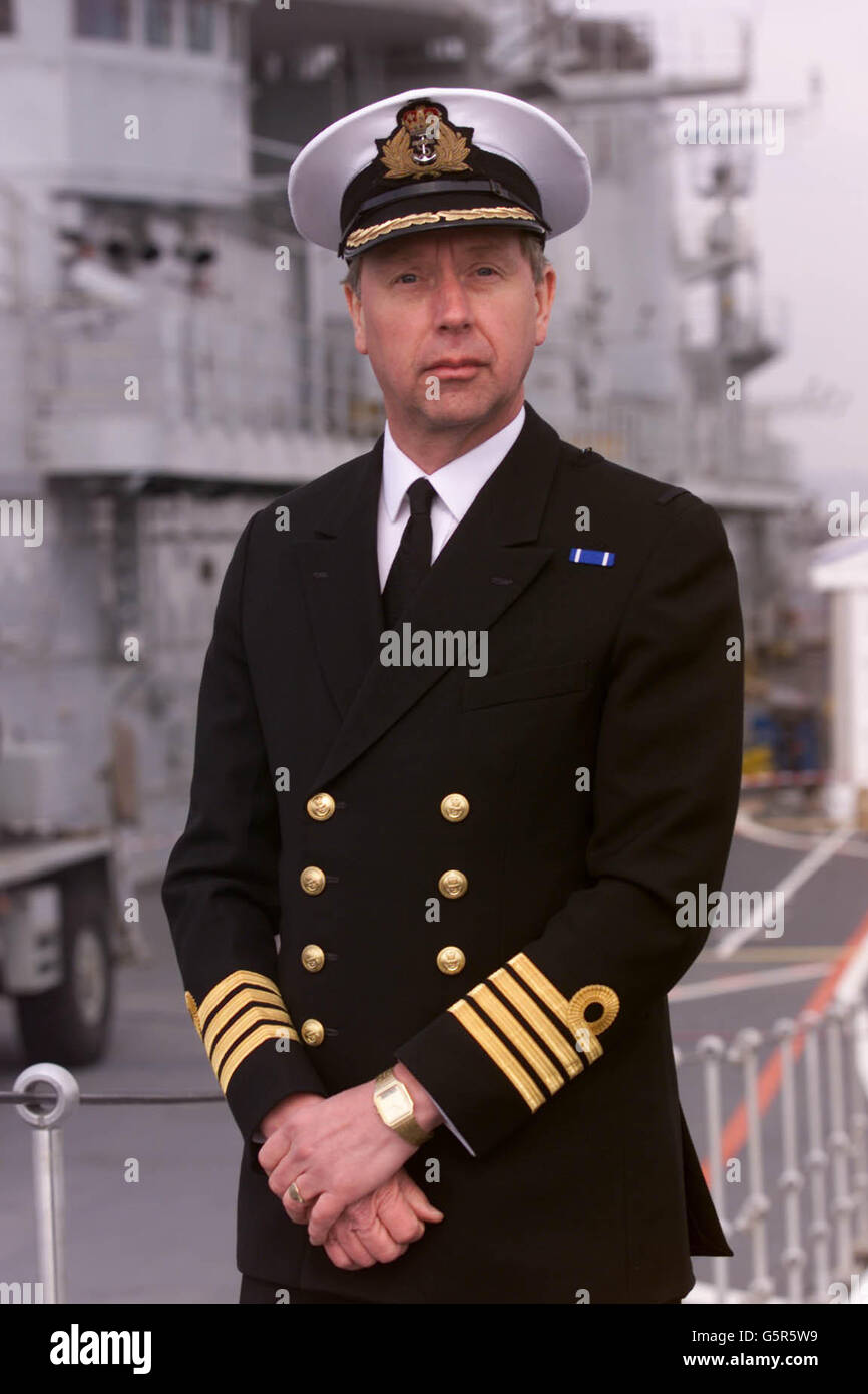 Captain David Snelson stands on the bow of HMS Ark Royal in Portsmouth ...