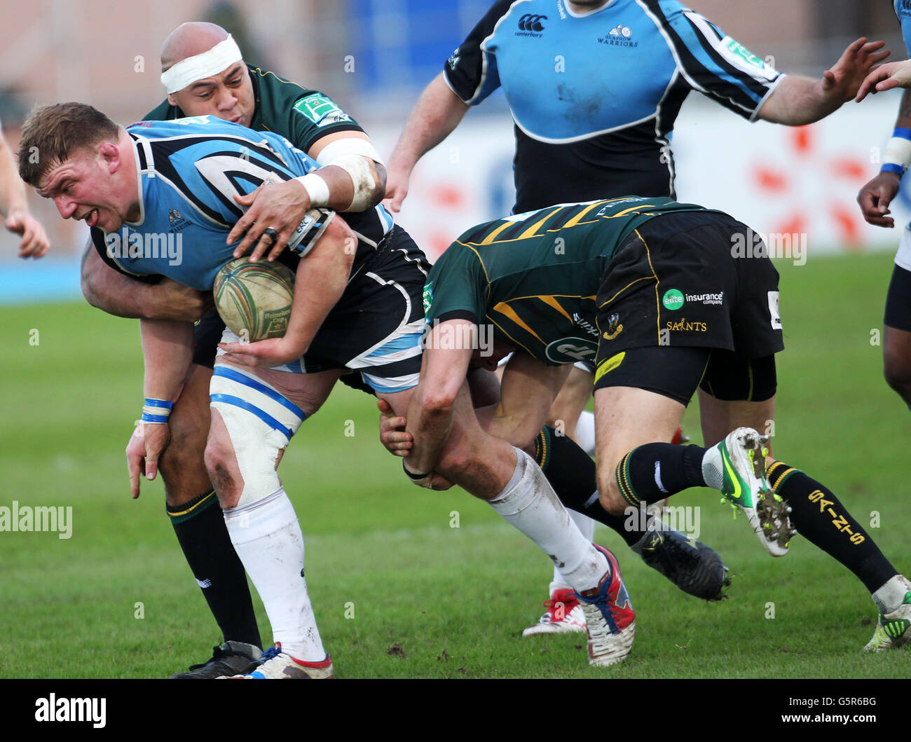 Glasgow Warrior's Moray Low is tackled by Northampton Saints Soane ...