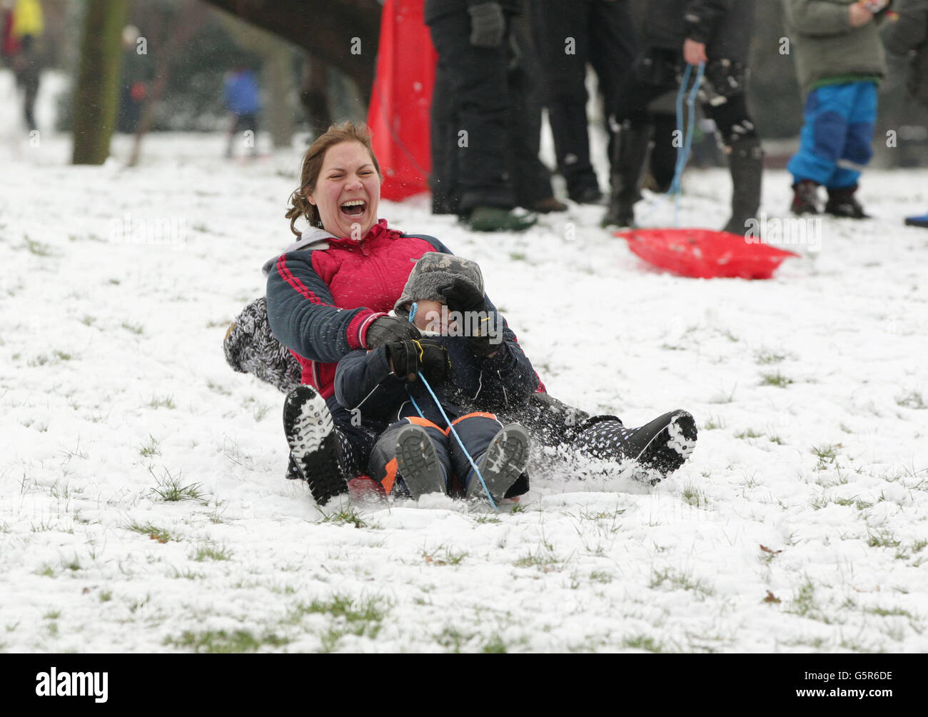 People sledging in the snow at Alexandra Palace in north London Stock ...