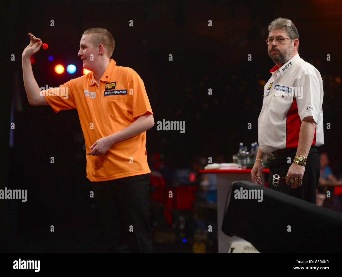 Jimmy Hendriks (left) and Martin Adams in action during the BDO World ...