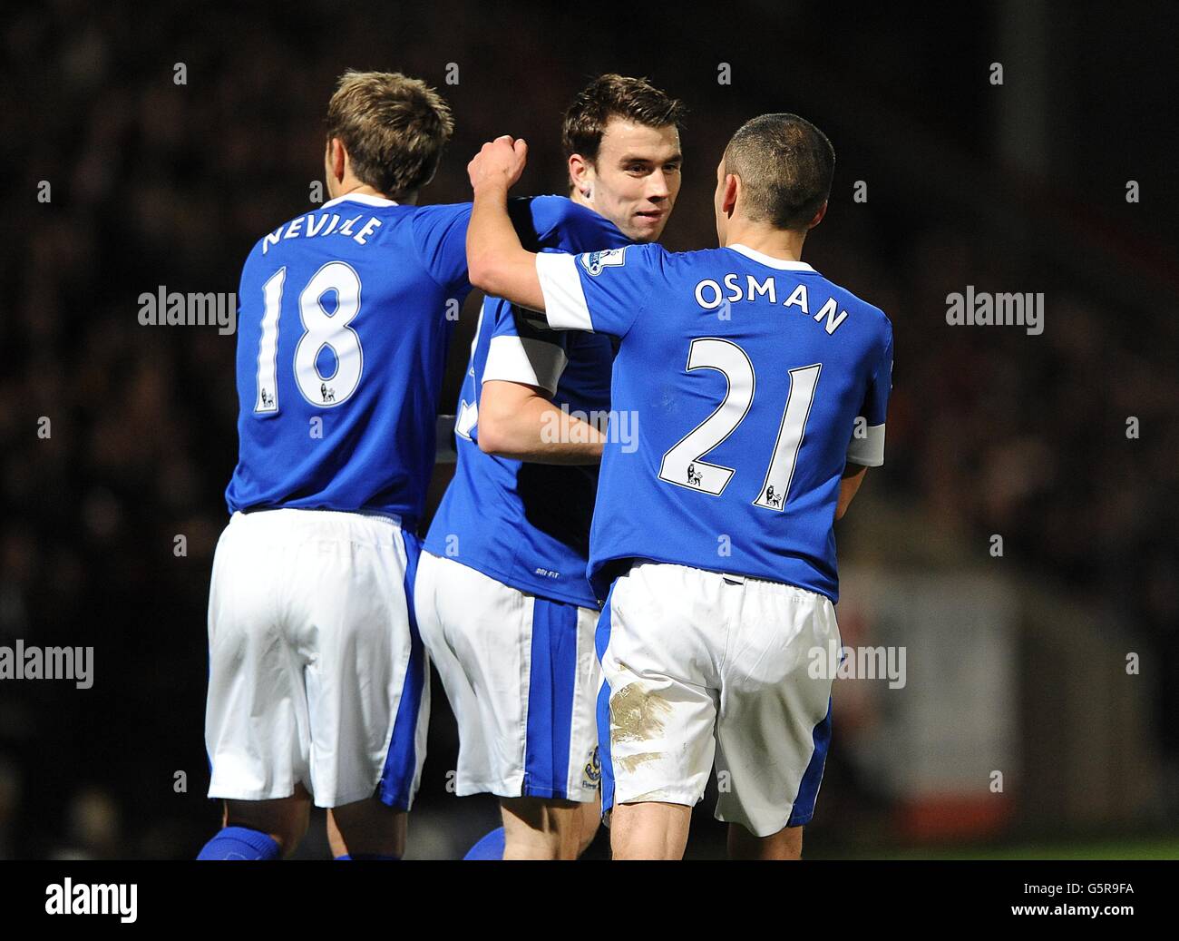 Everton's Seamus Coleman (centre) celebrates scoring with teammates ...