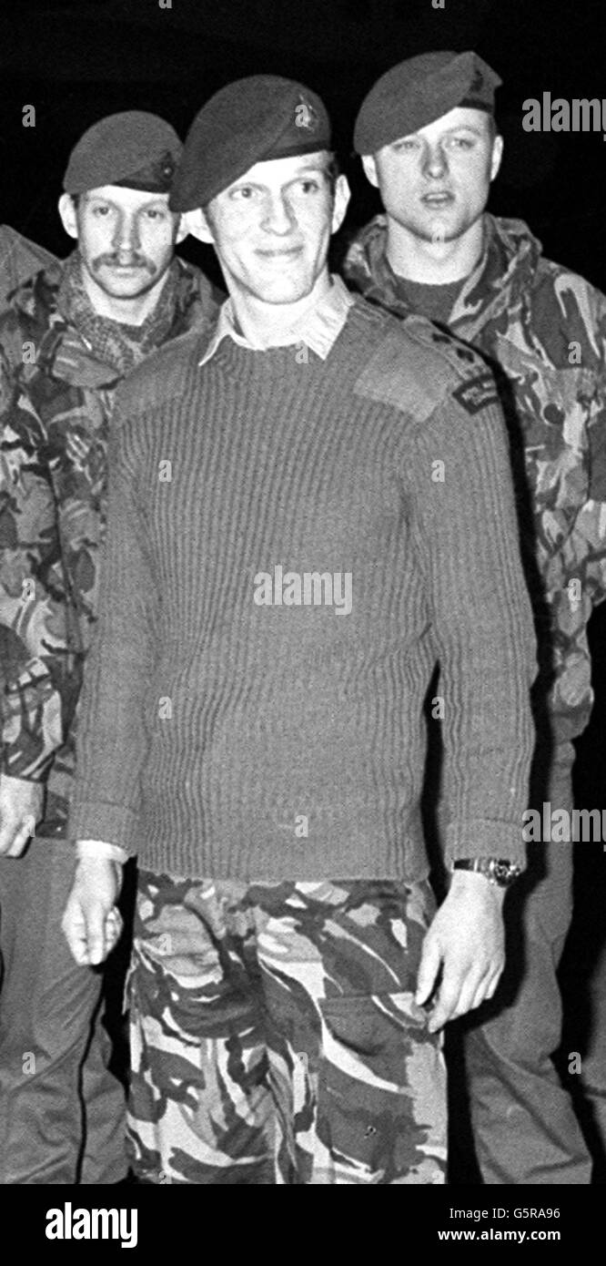 Acting Lieutenant Keith Mills (centre) of the Royal Marines, who has ...