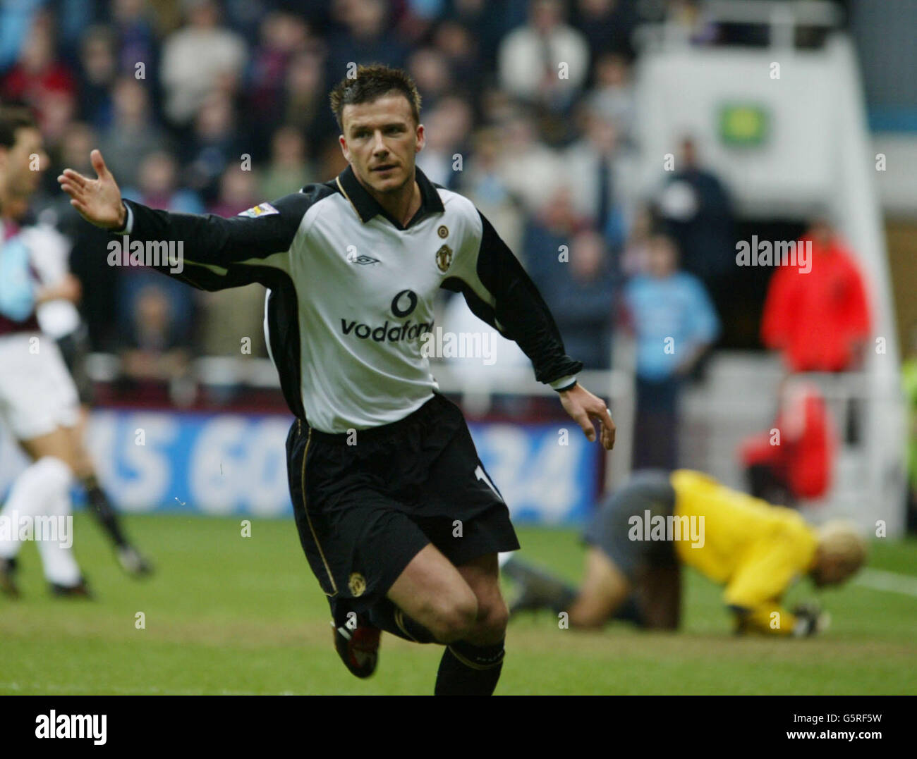 Manchester United's David Beckham turns after scoring the 1st goal ...