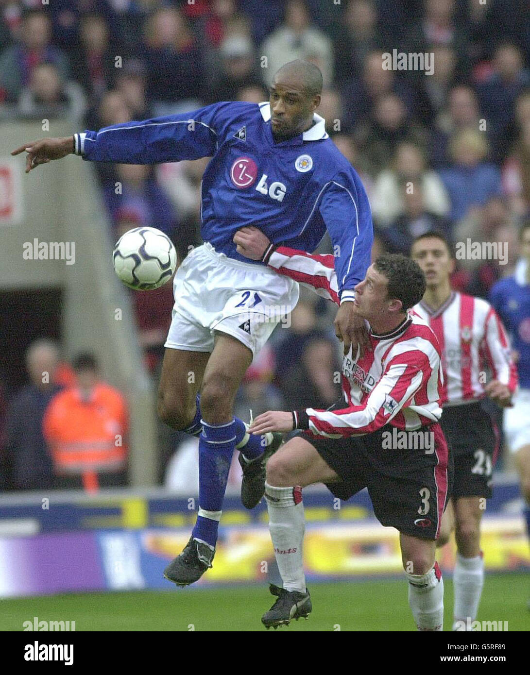 Wayne Bridge (right) of Southampton tackles Brian Deane of Leicester ...