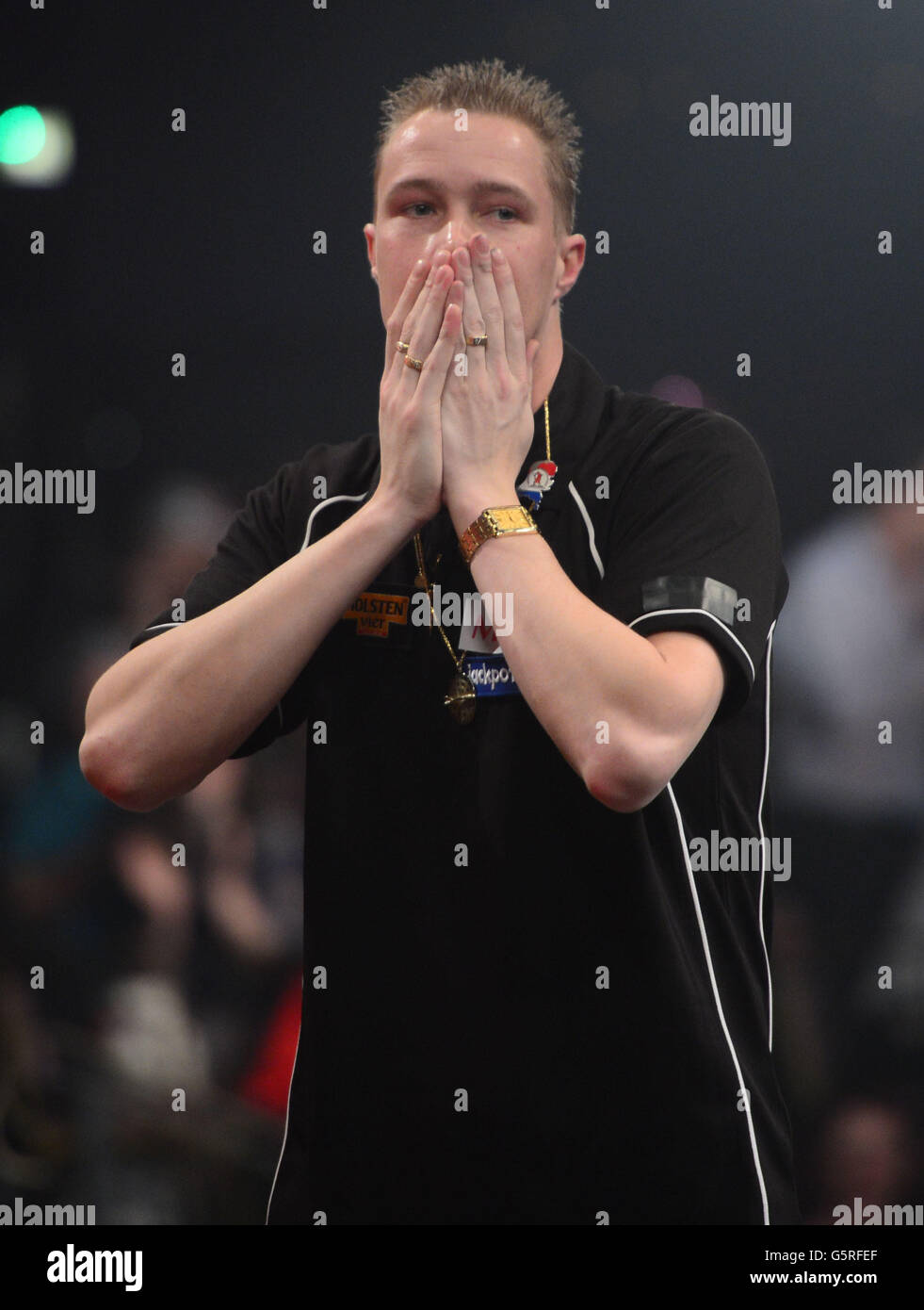 Wesley Harms celebrates defeating Darryl Fitton during the BDO World ...
