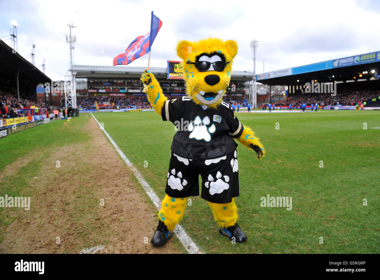 NFL team Jacksonville Jaguars mascot Jackson DeVille waves a Crystal ...