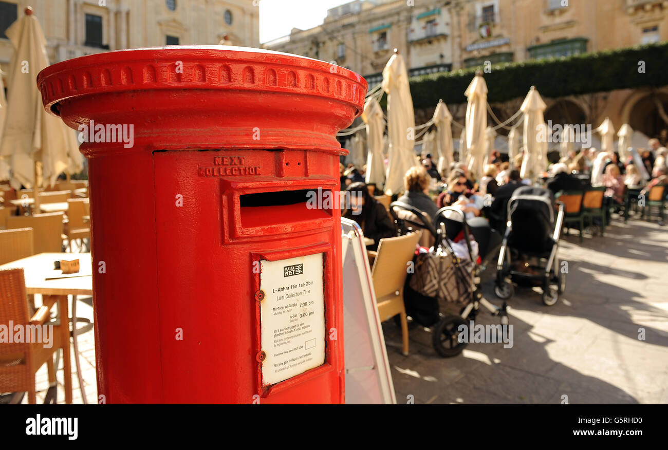 General view of a British style red postbox on the streets of Valletta ...