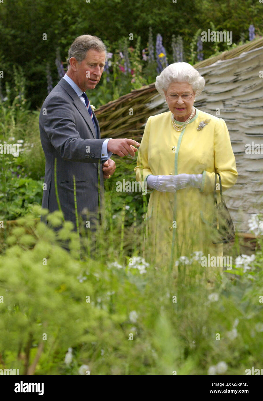 Queen Elizabeth II and the Prince of Wales look at the 'Healing Garden ...