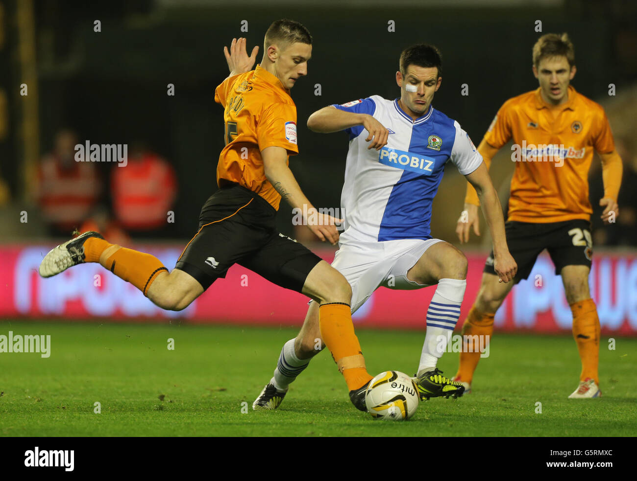 Wolverhampton Wanderers' Jake Cassidy shot at goal is challenged by ...