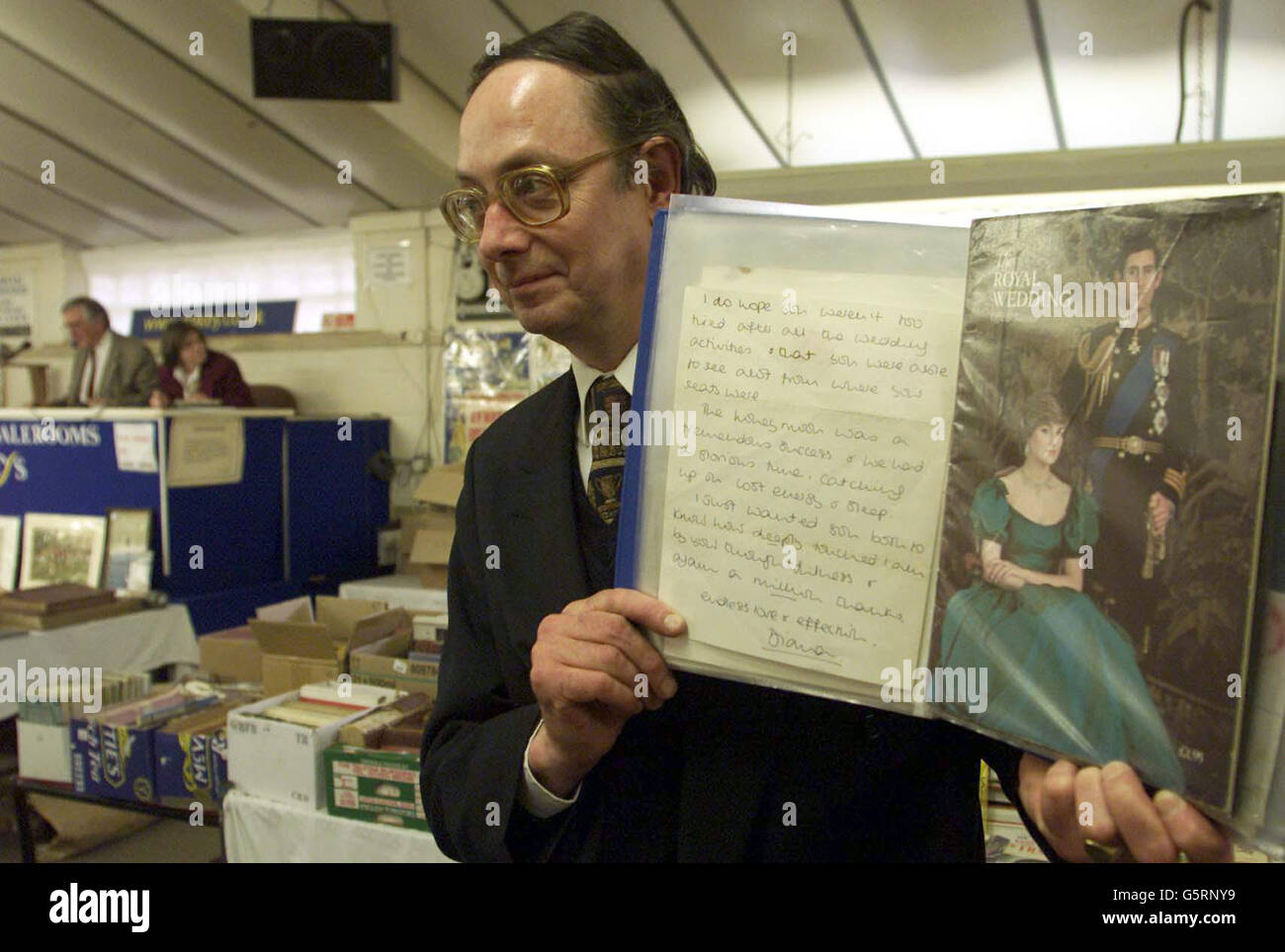 Andrew Bullock, from the Keys Auction Rooms in Aylsham, Norfolk, holds ...