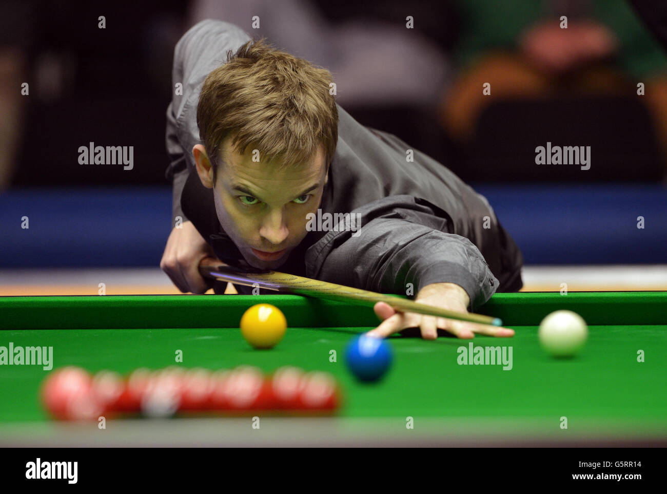Allister Carter in action against John Higgins during day two of the ...