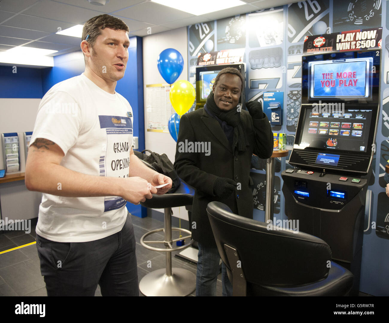 A punter celebrates winning on a new gambling machine during the ...