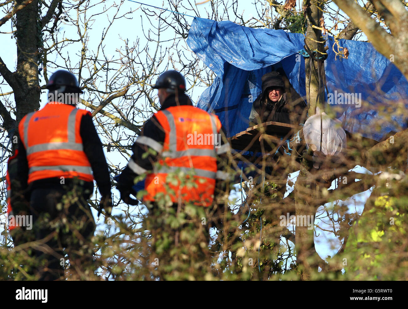 A road protestor negotiates with bailiffs as she becomes the final ...