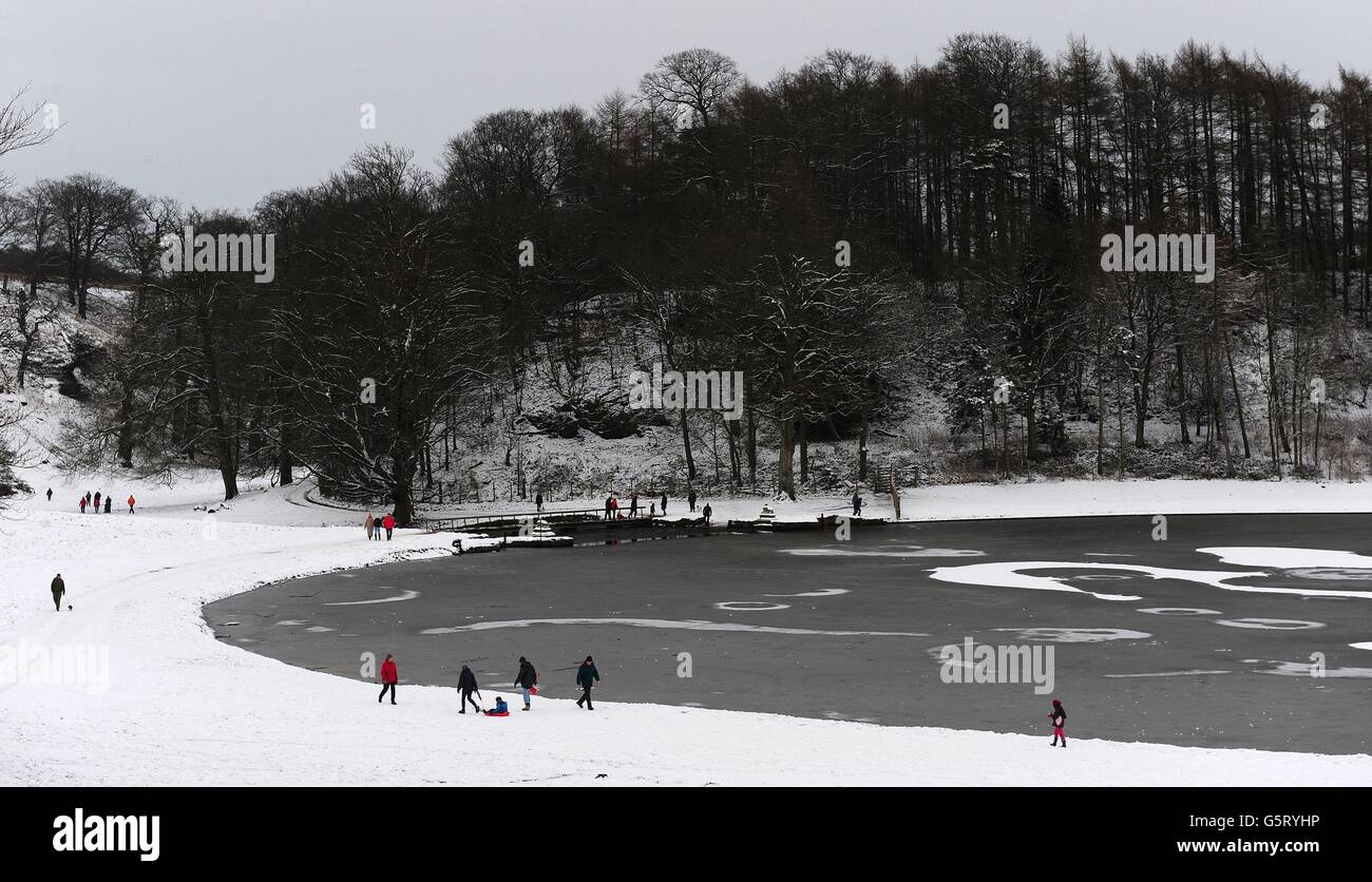 Taking a walk around the partially frozen lake at Studley Royal Park ...