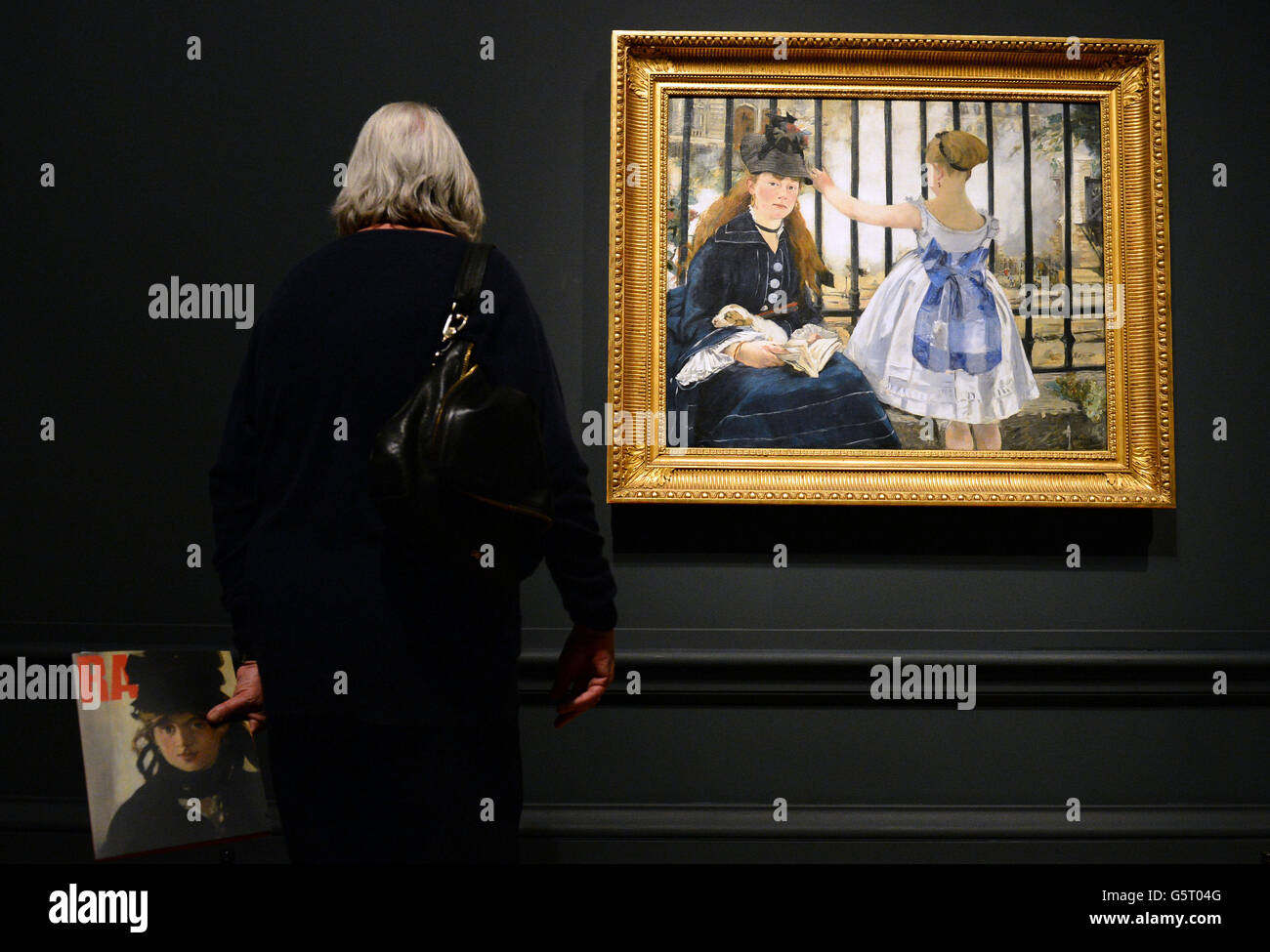 A visitor views Edouard Manet's 'The Railway' during a press view of ...