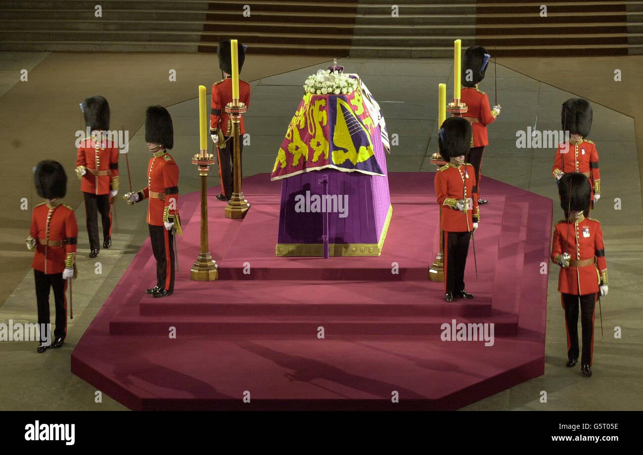 The flag draped coffin of Queen Elizabeth the Queen Mother, stands in ...