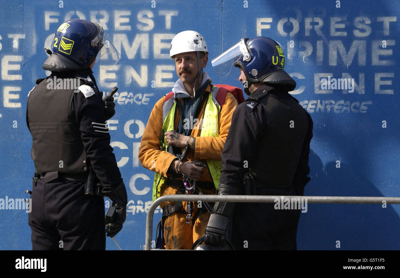 Police officers riot gear environmental activist luminous wear helmet ...