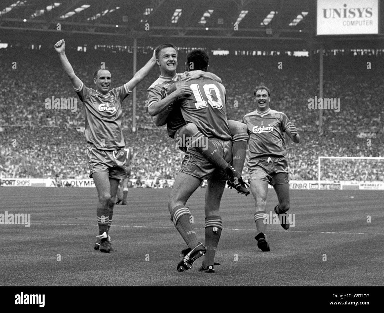 Wimbledon's Wembley hero, Lawrie Sanchez, signals his 36th minute goal ...