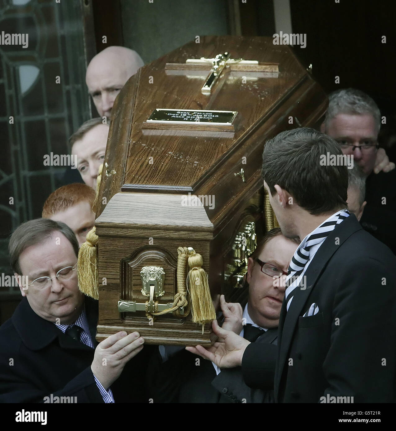 The coffin of former Celtic assistant manager Sean Fallon is carried ...