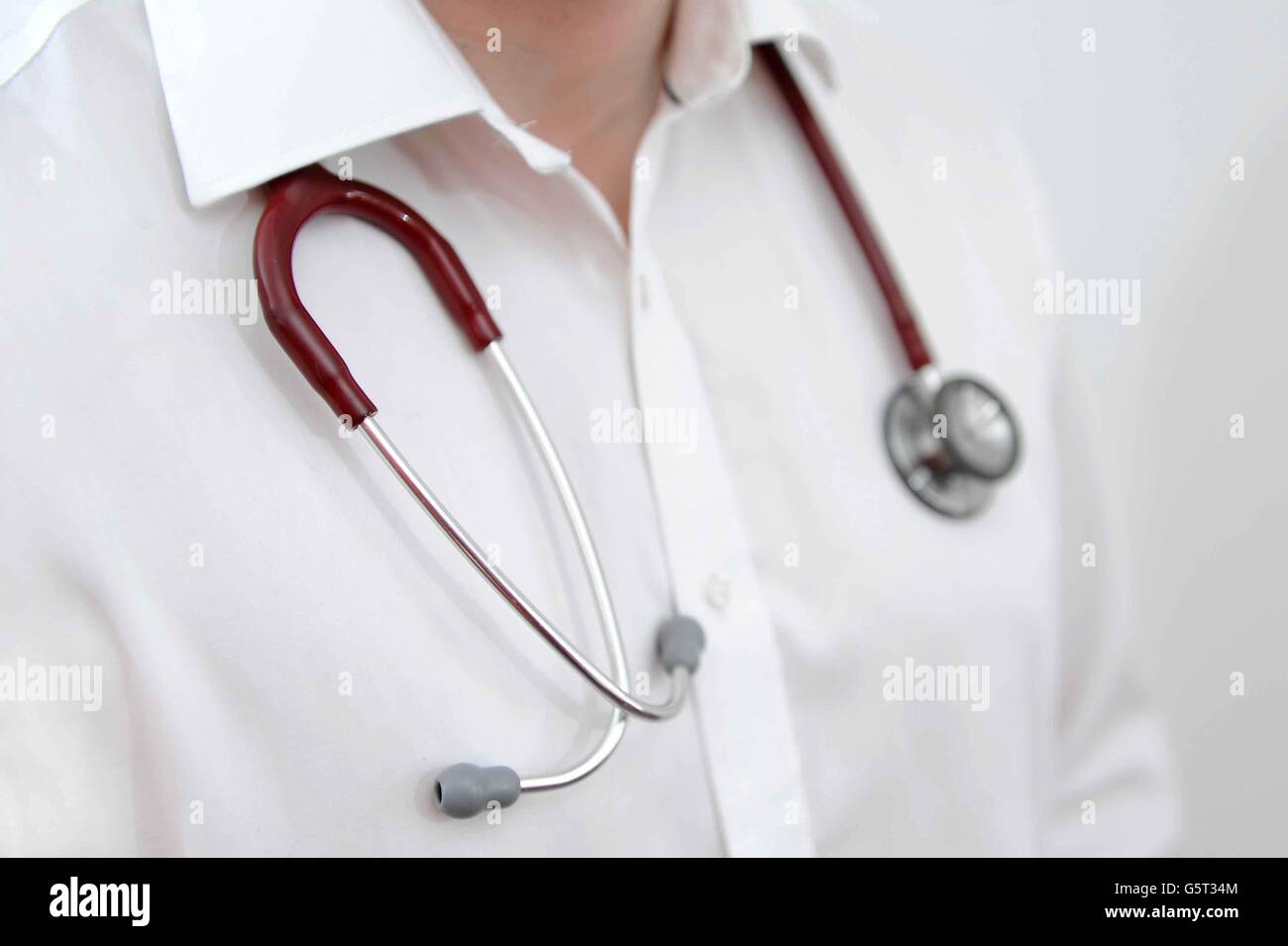 A Model poses with a Stethoscope around the neck Stock Photo - Alamy