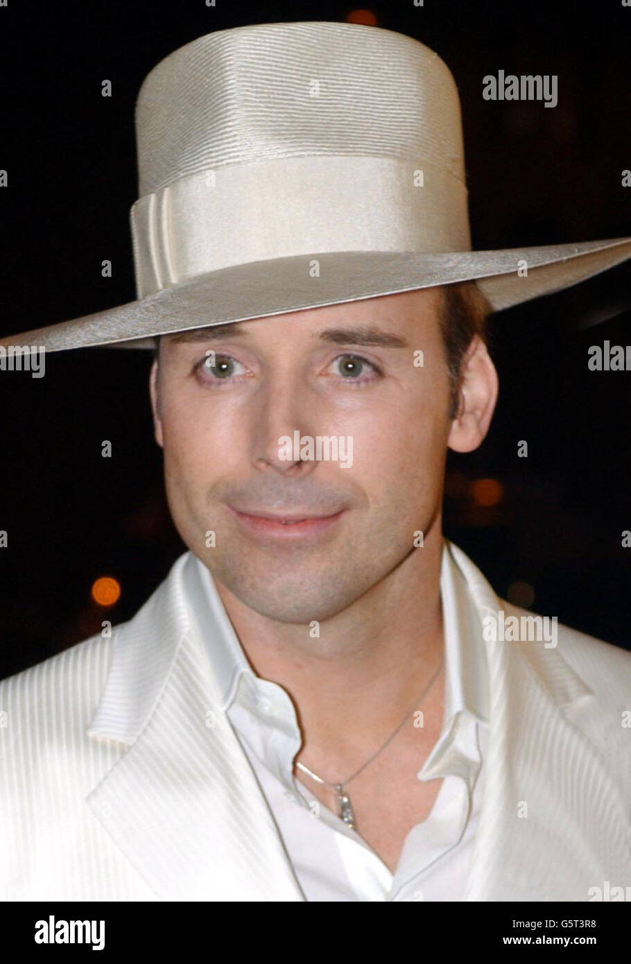 David Furnish arrives for the Moet & Chandon Philip Treacy Tribute 2002 ...