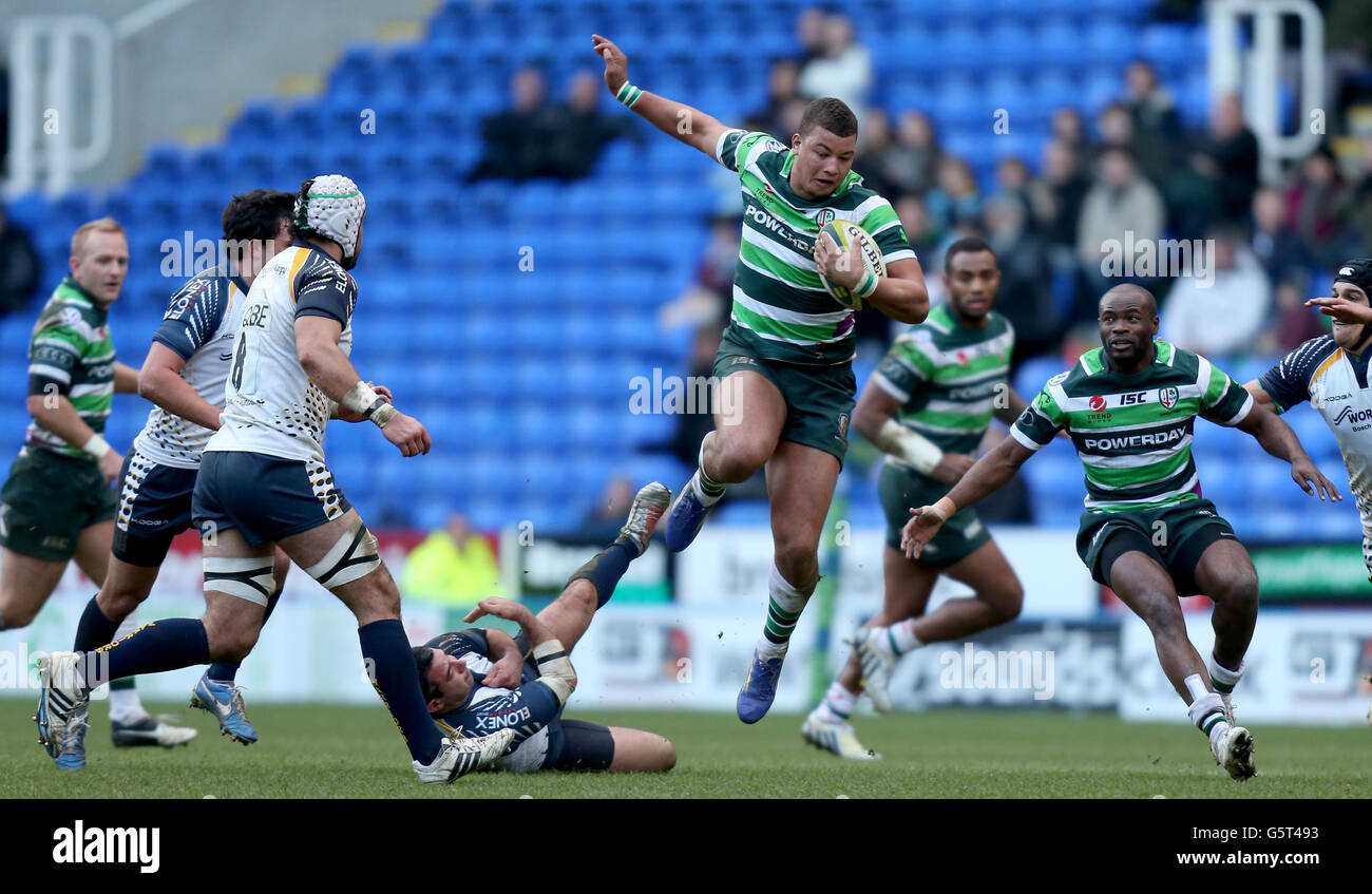 London Irish's Guy Armitage eludes the tackle of Worcester's Danny Gray ...