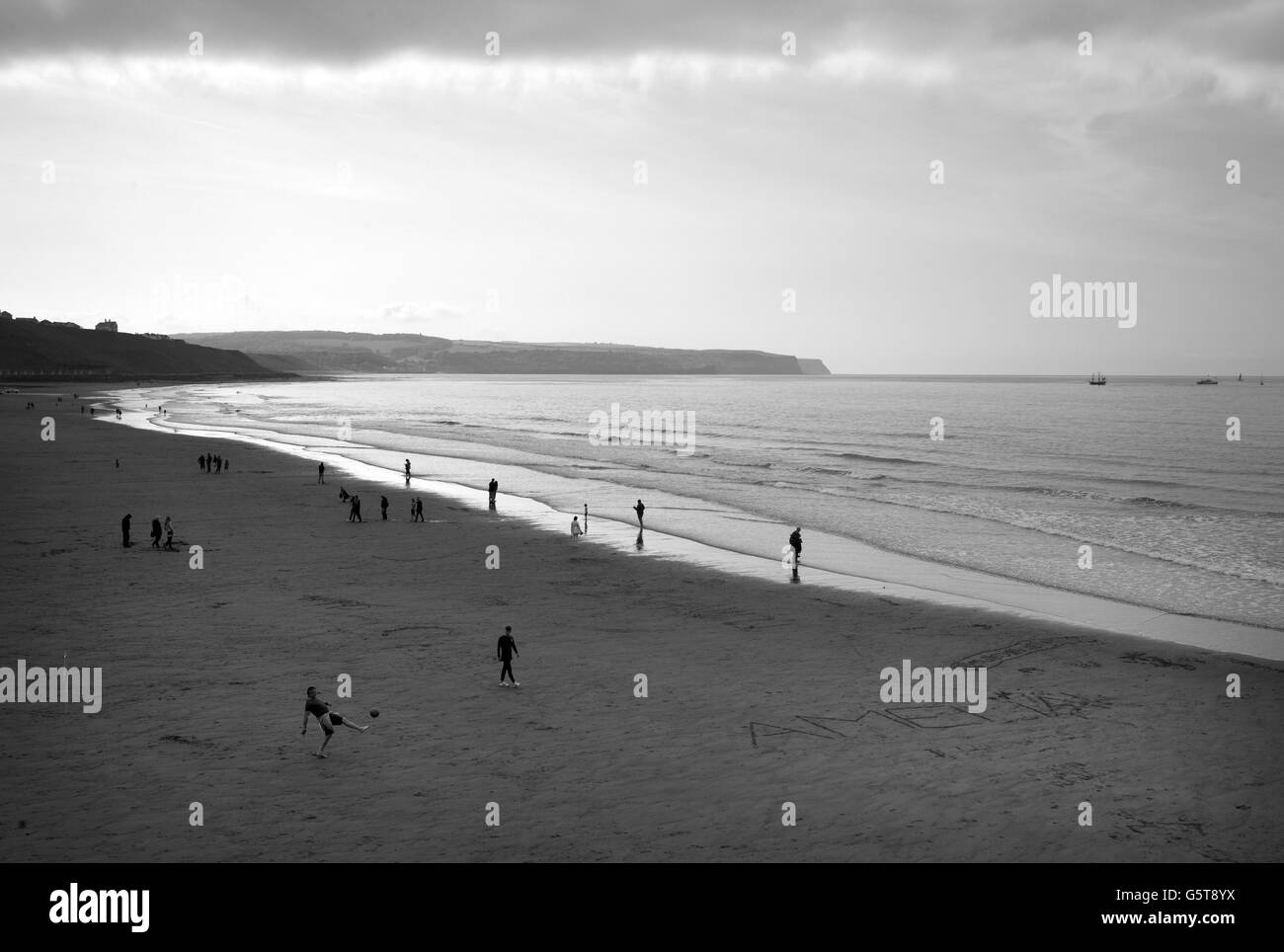 Whitby beach cliffs hi-res stock photography and images - Alamy