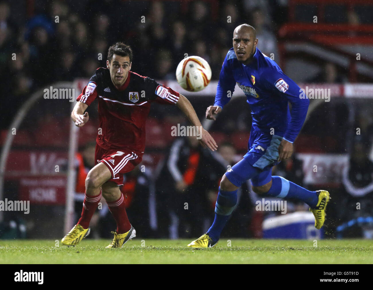 Bristol City's Sam Baldock and Watford's Fitz Hall (right) battle for ...