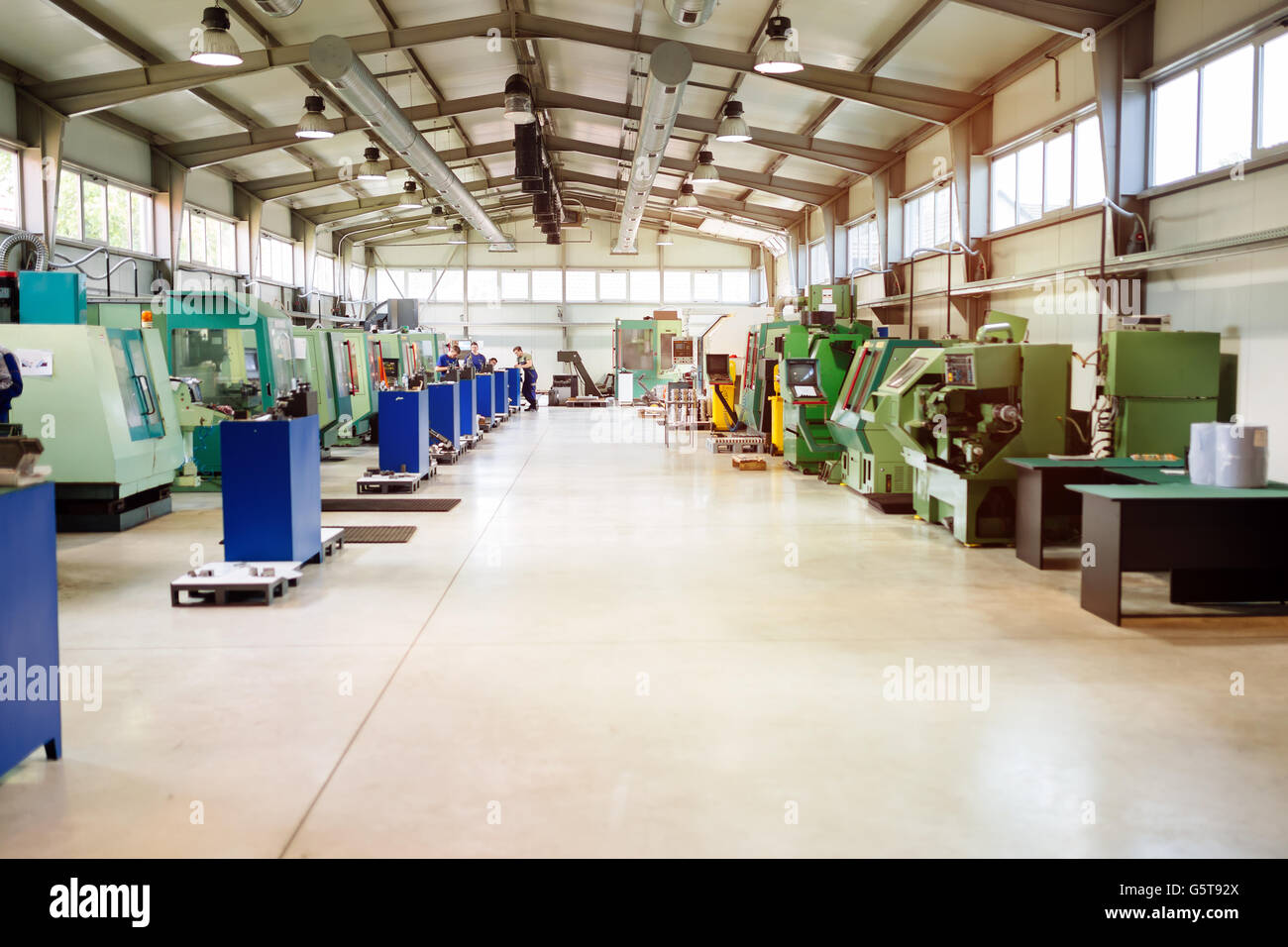 Factory manufacturing metal parts equipped with cnc machines Stock ...