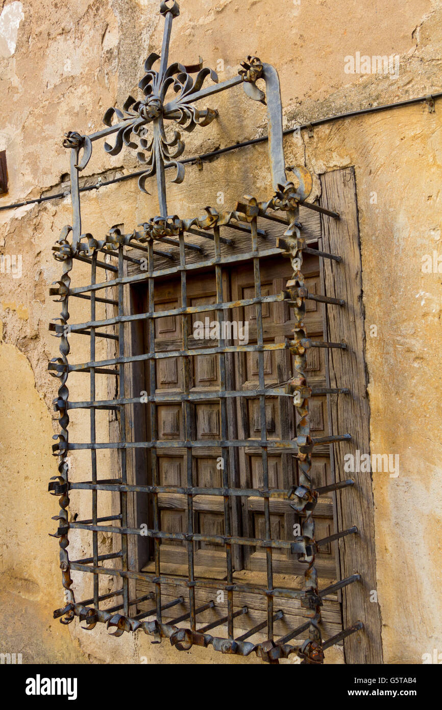 old window with an old fence protection Stock Photo - Alamy