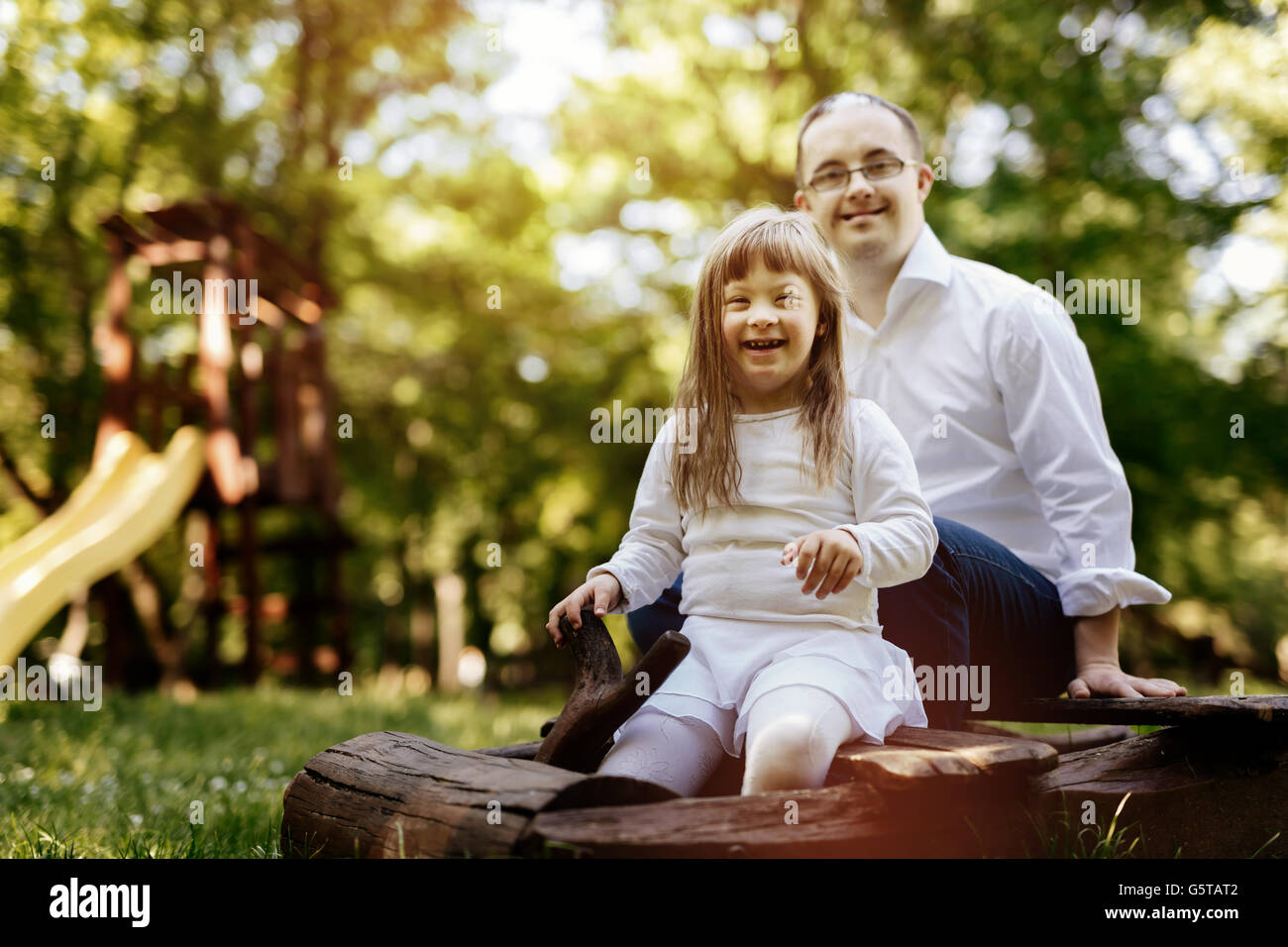 People with down syndrome having fun outdoors and smiling Stock Photo ...