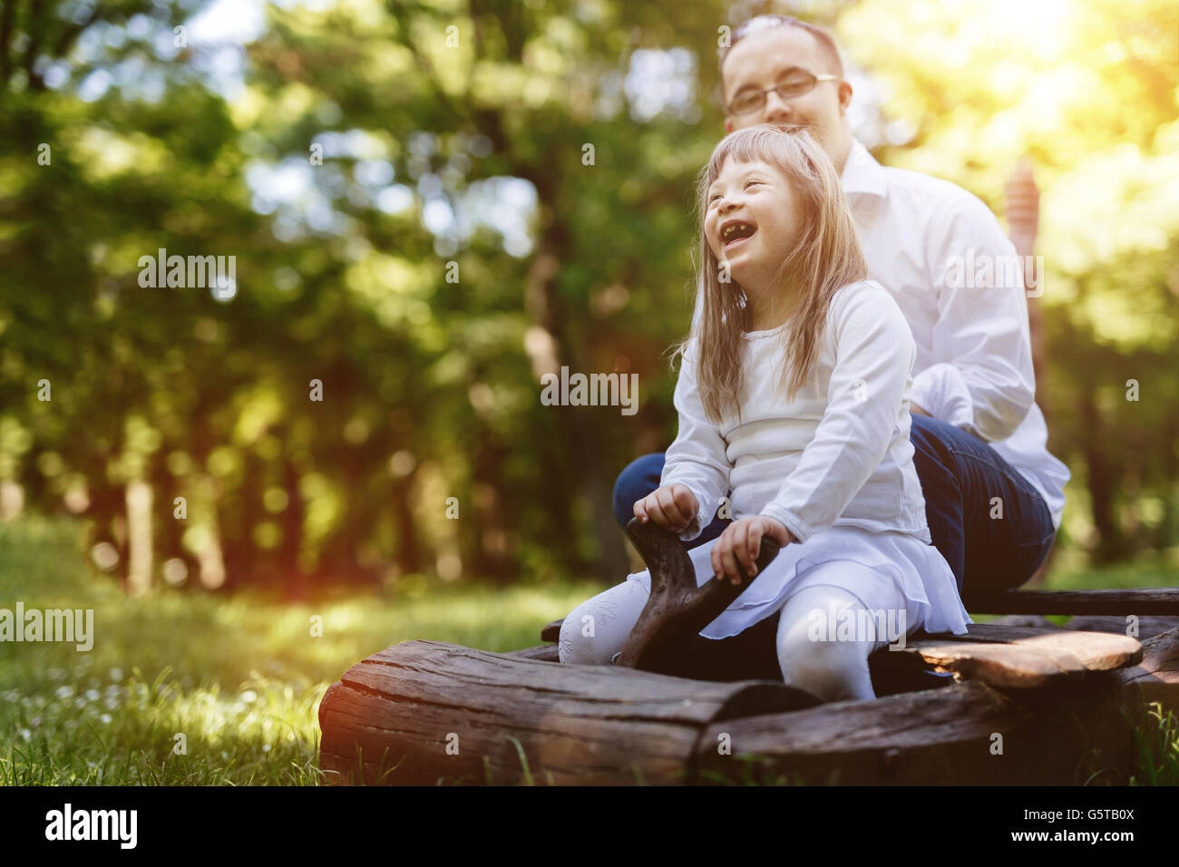 People with down syndrome having fun outdoors and smiling Stock Photo ...