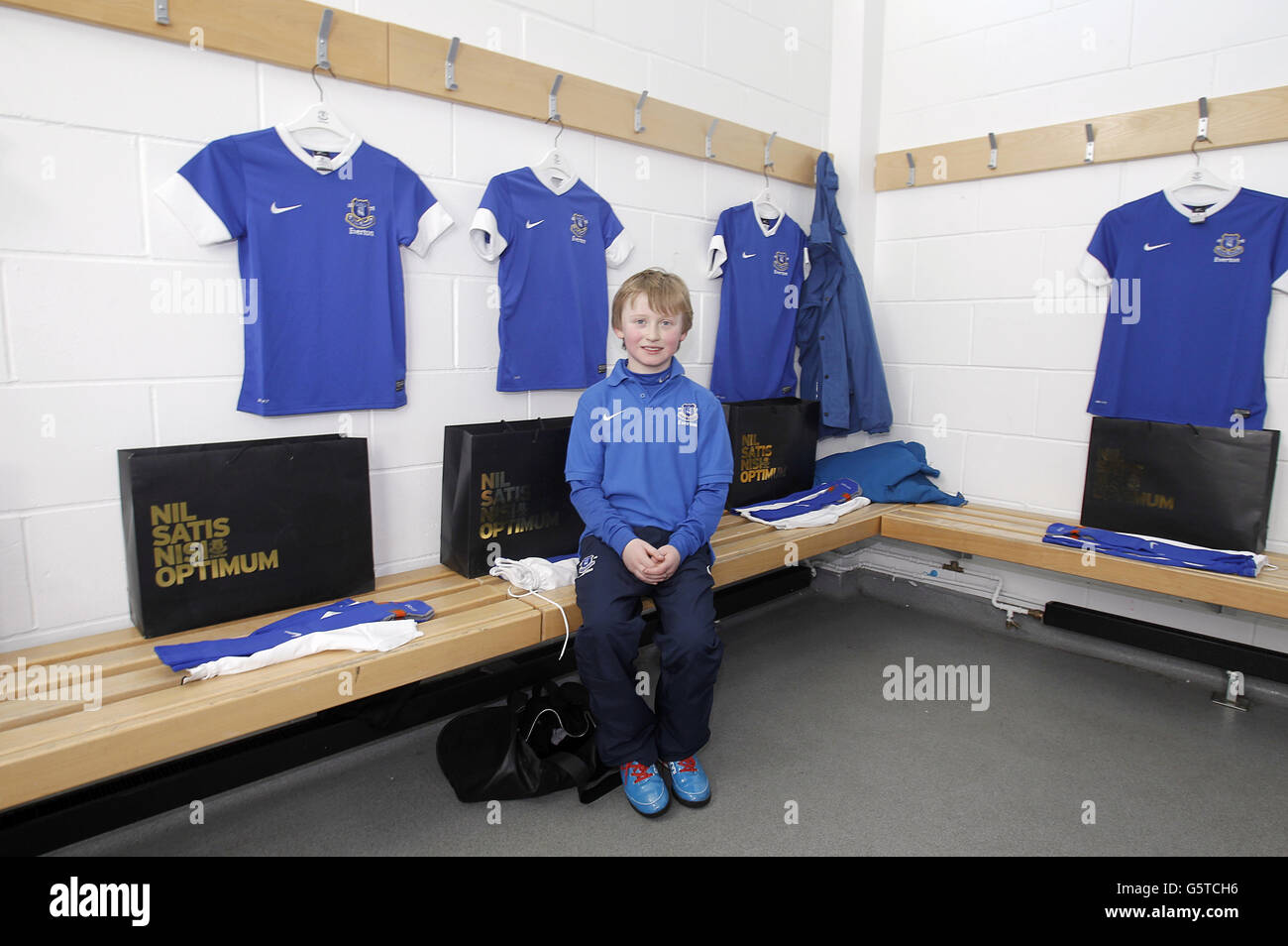 An Official Everton mascot in the dressing rooms at Finch Farm during ...