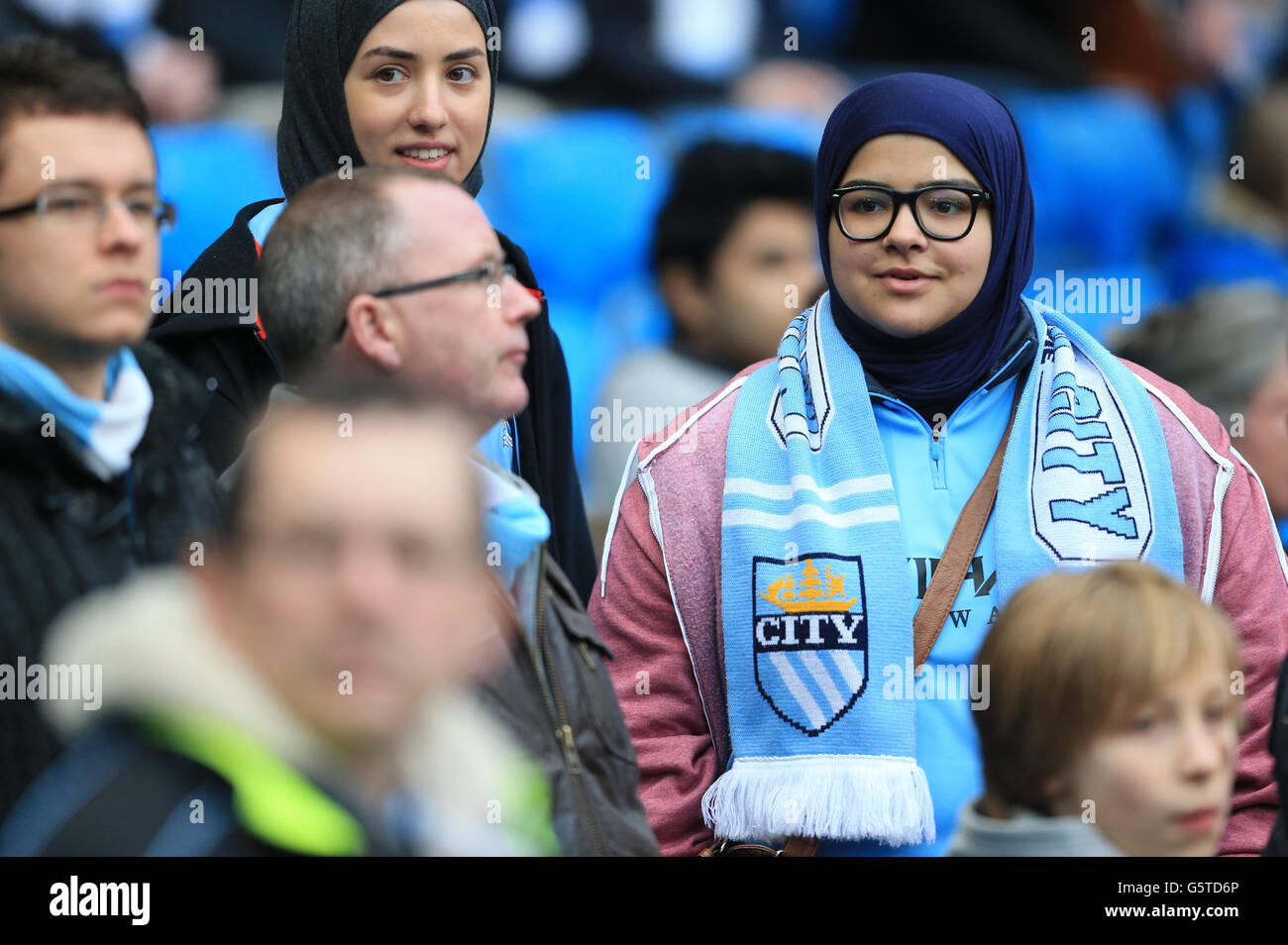 Female manchester city fan in the stands before the game hi-res stock ...