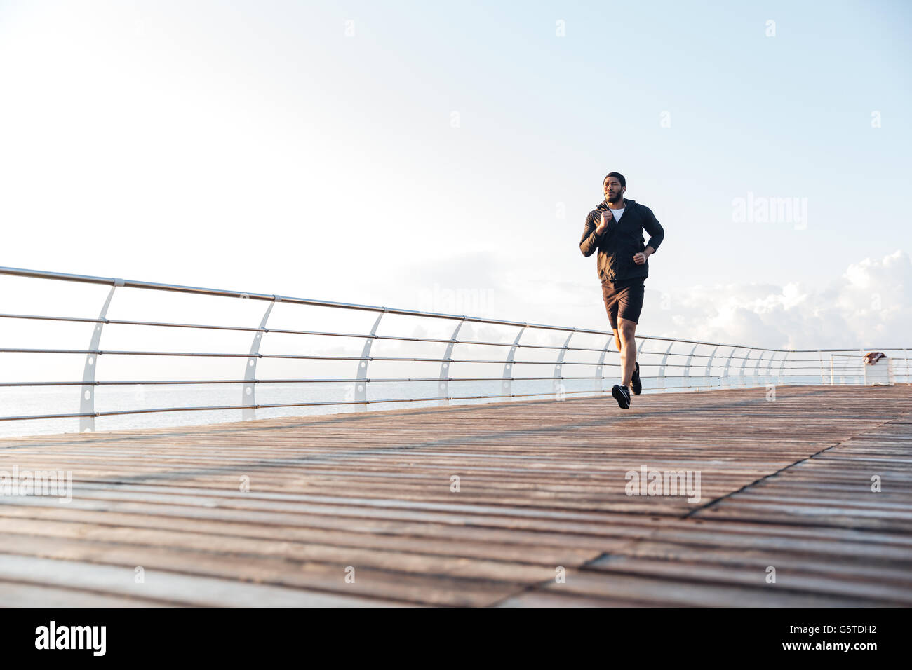 Attractive handsome guy running hi-res stock photography and images - Alamy