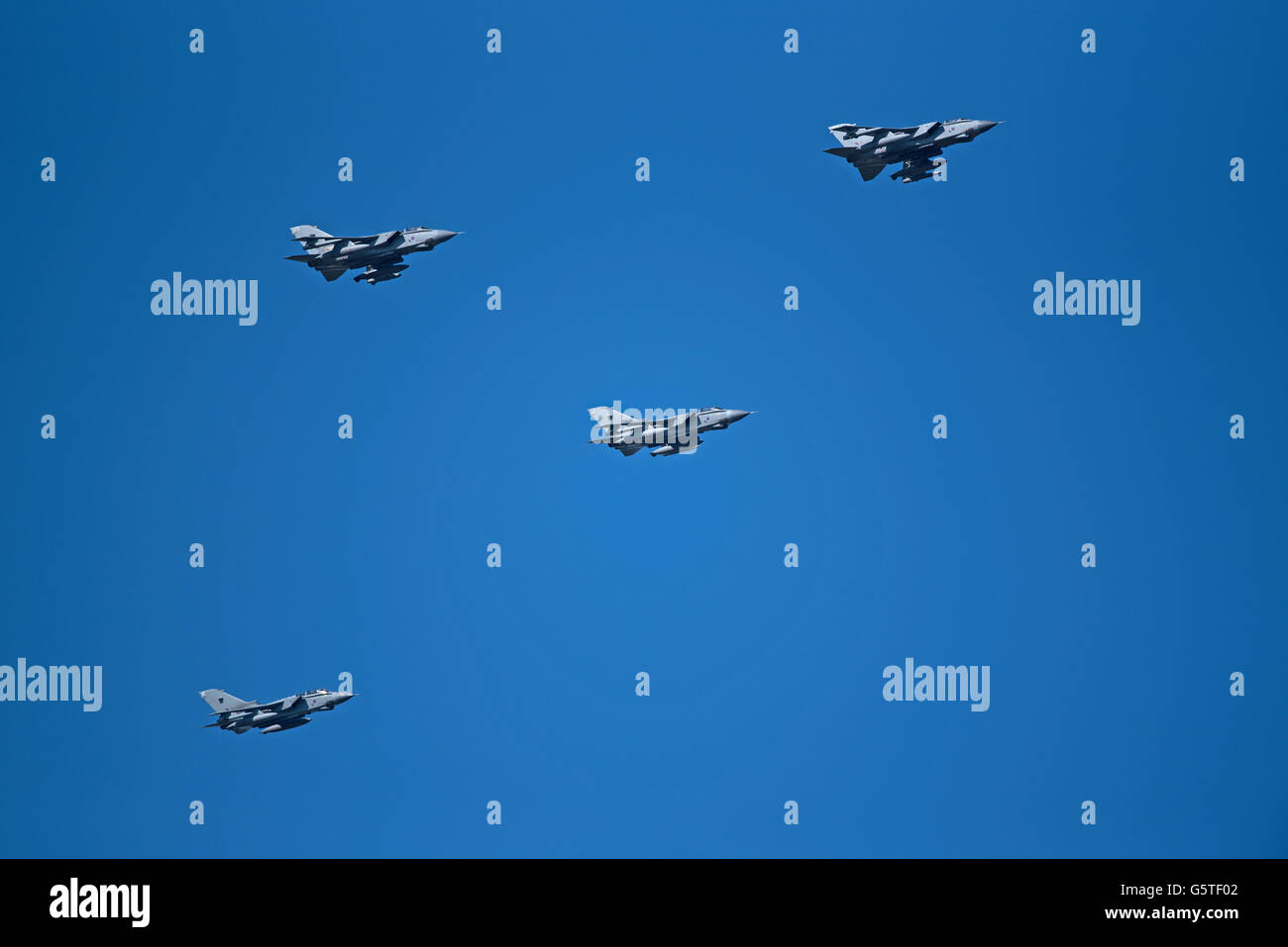 A flight of 4 GR4 RAF Tornadoes pass overhead at Lossiemouth Air Base ...