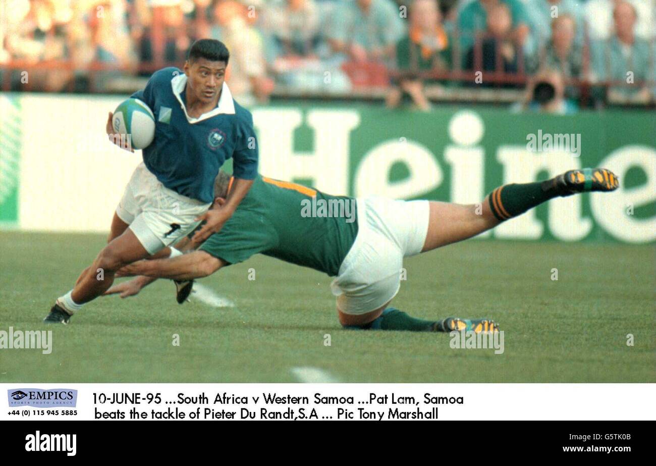 Pat Lam,Samoa beats the tackle of Pieter Du Randt,S.A Stock Photo - Alamy