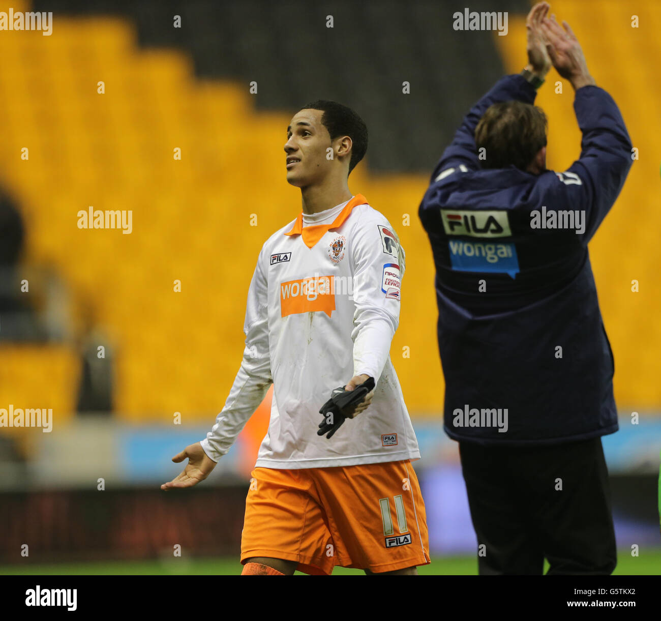 Blackpool's Thomas Ince looks up to his parents Paul Ince and Claire ...