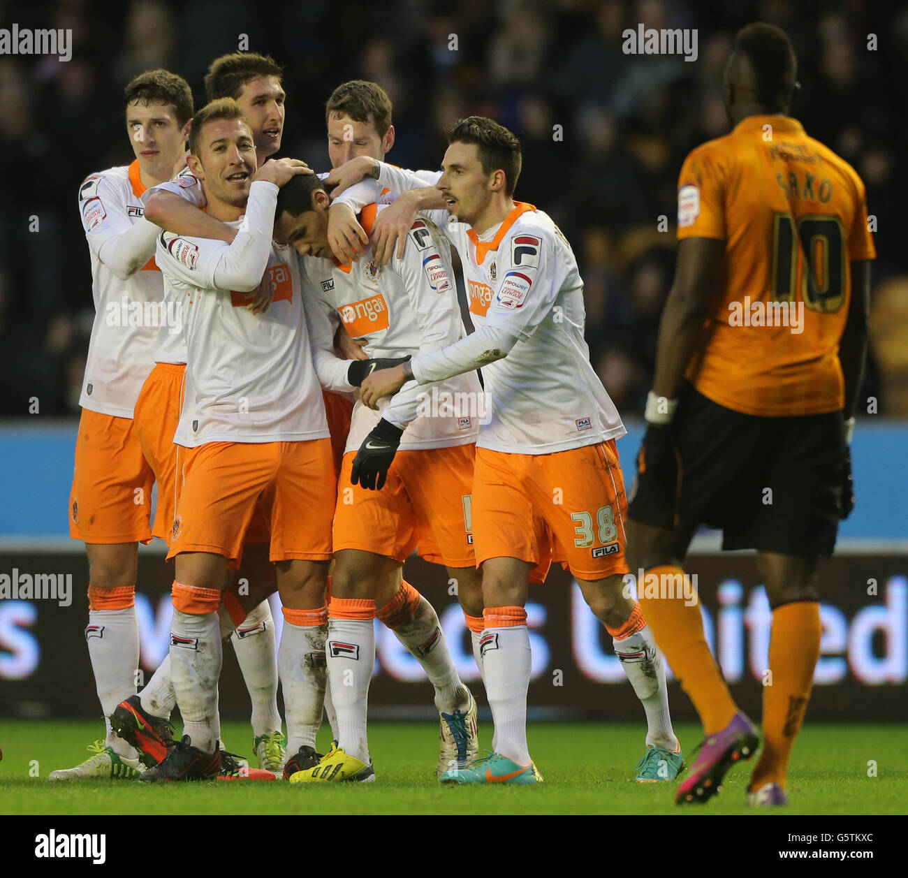 Blackpool's Thomas Ince is mobbed by teamates as they celebrates Ince ...