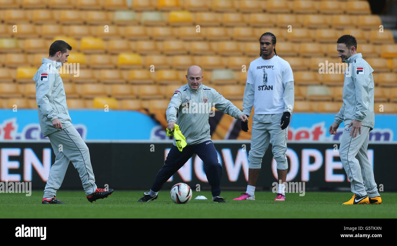 Blackpool's coach Alan Wright warms up players before the npower ...