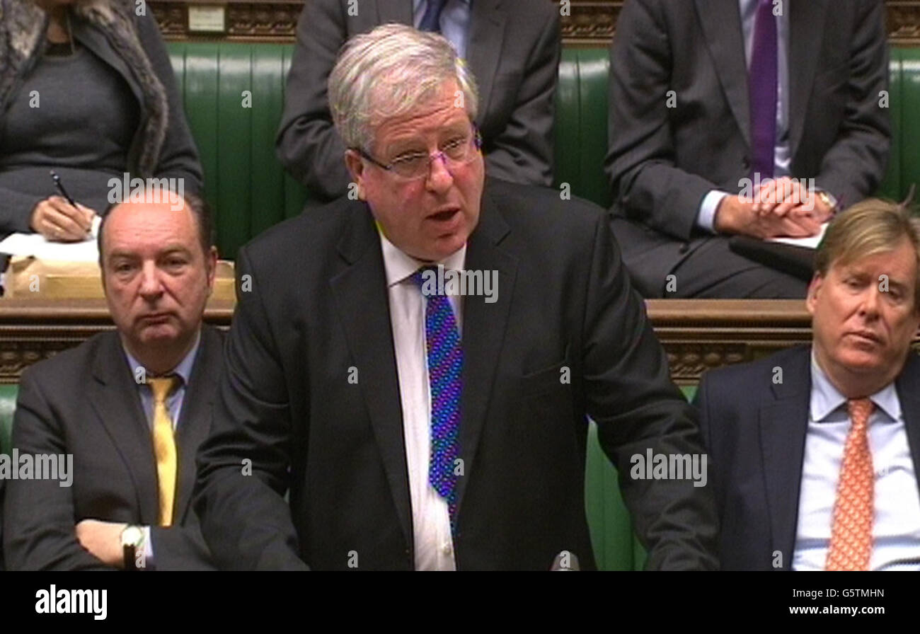 Transport Secretary Patrick McLoughlin reads a statement to the House ...